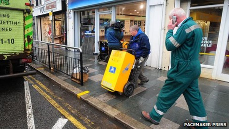 Downpatrick flooding: Clean-up operation under way - BBC News