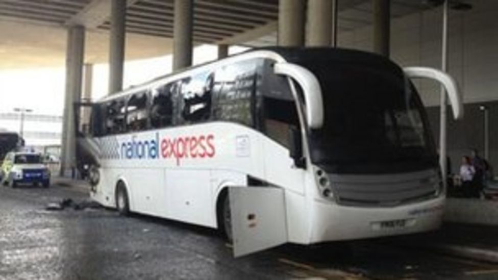 Coach catches fire at Gatwick Airport - BBC News