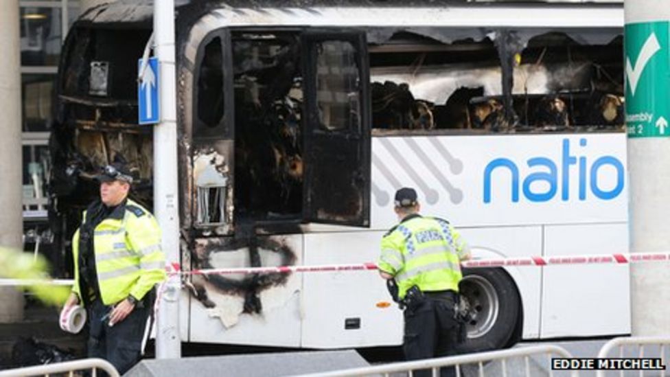 Coach catches fire at Gatwick Airport - BBC News