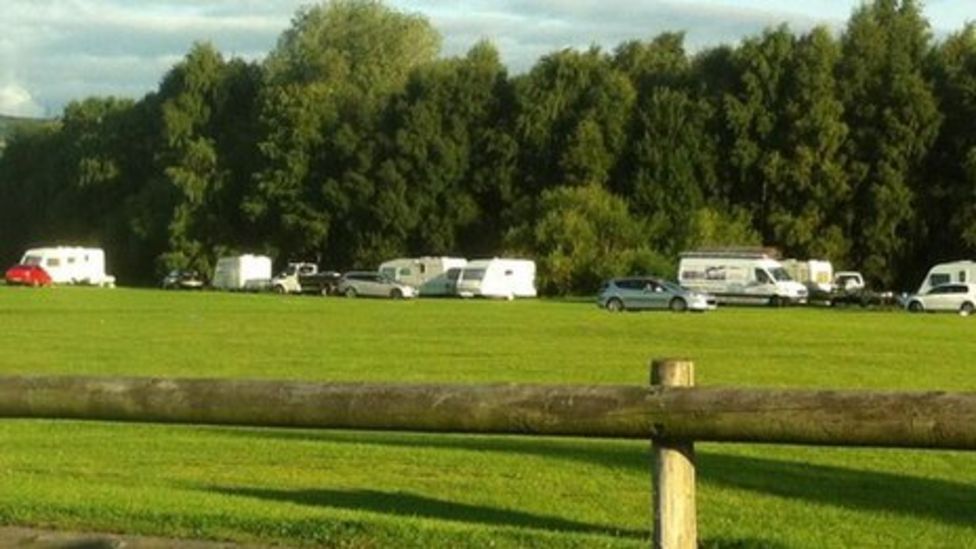 Travellers set up on Alyn Waters Country Park in Wrexham - BBC News