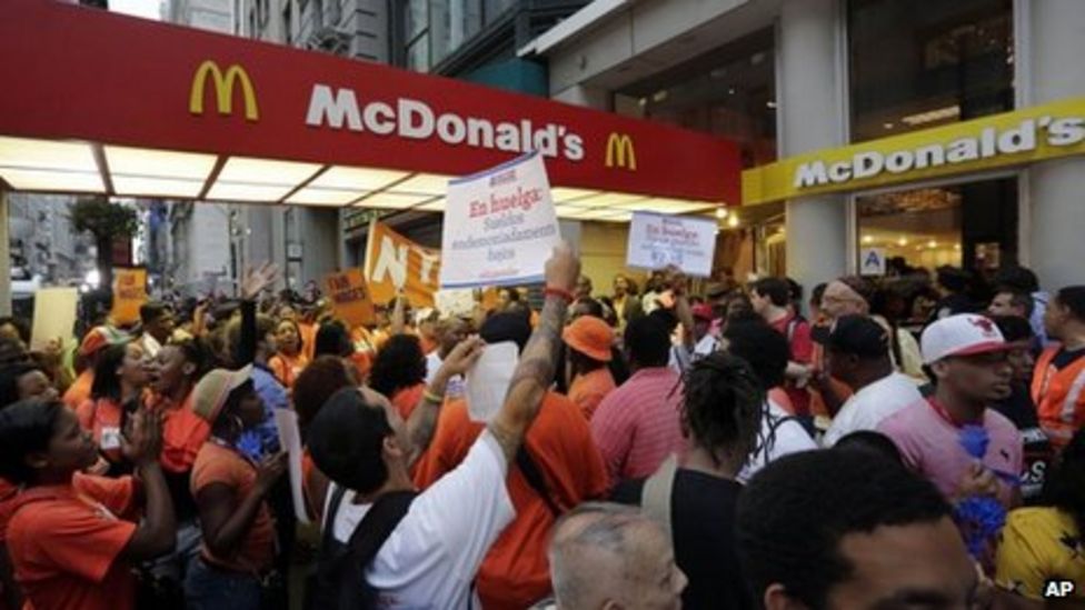 US fast-food workers on strike over pay - BBC News