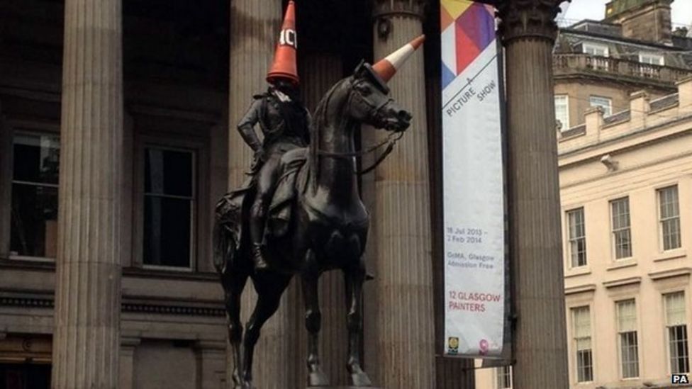 Why Do People Put Traffic Cones On Statues Bbc News