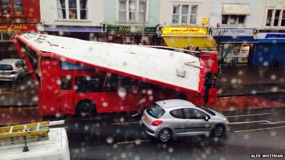 Bus hits railway bridge in Kingston after wrong turn - BBC News