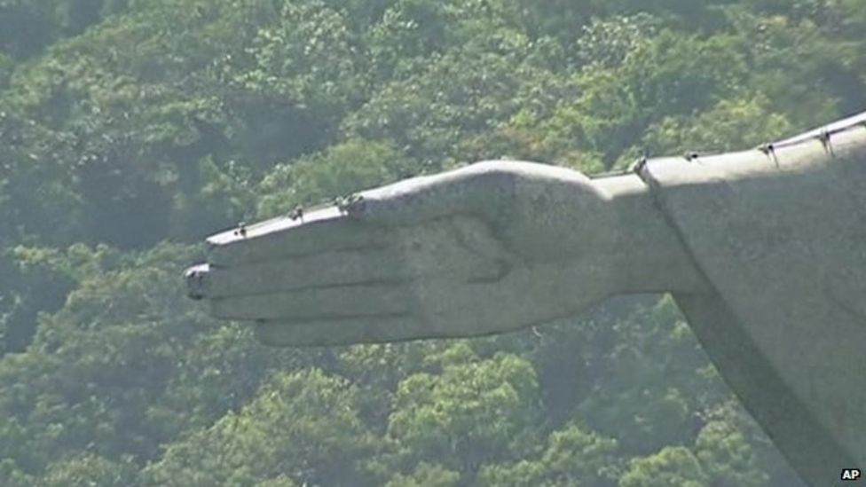 Rio's Christ the Redeemer statue's thumb chipped in storm - BBC News
