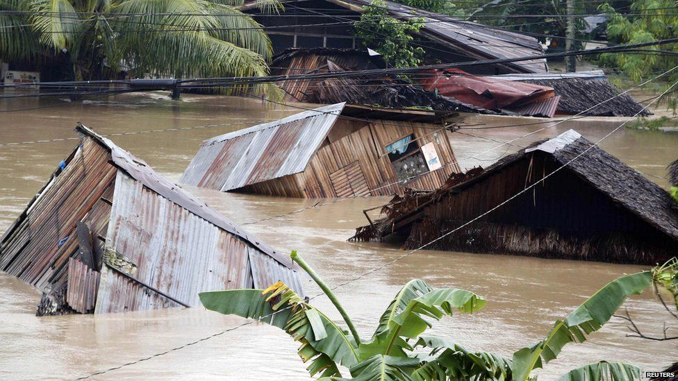 Philippines faces more flooding after tropical storm - BBC Newsround