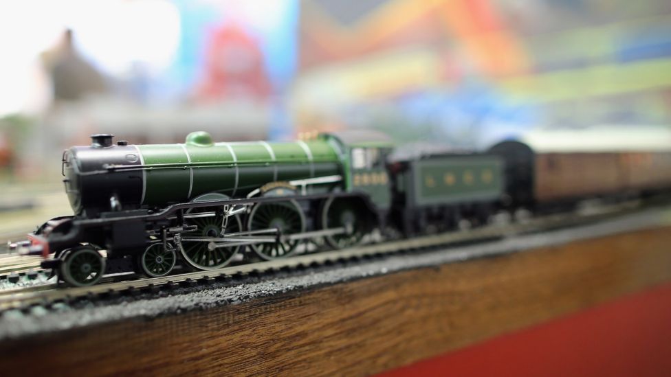 'Largest' model railway with miniature worlds opens in Wroxham - BBC News