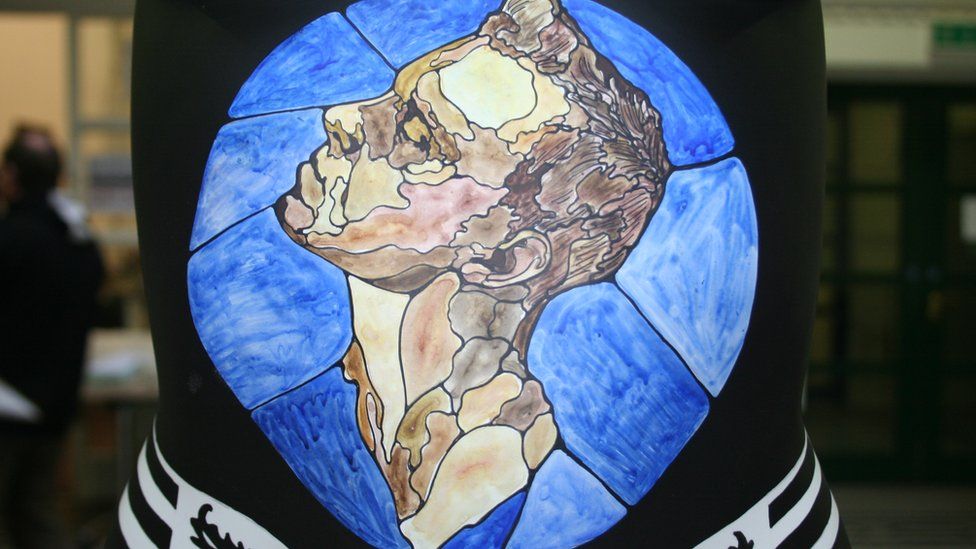 Robbie Williams paintings go on display for his 40th birthday - BBC News