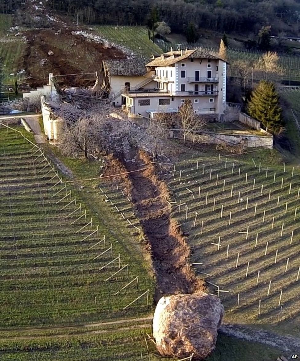 Boulder smashes through Italian farm - BBC News