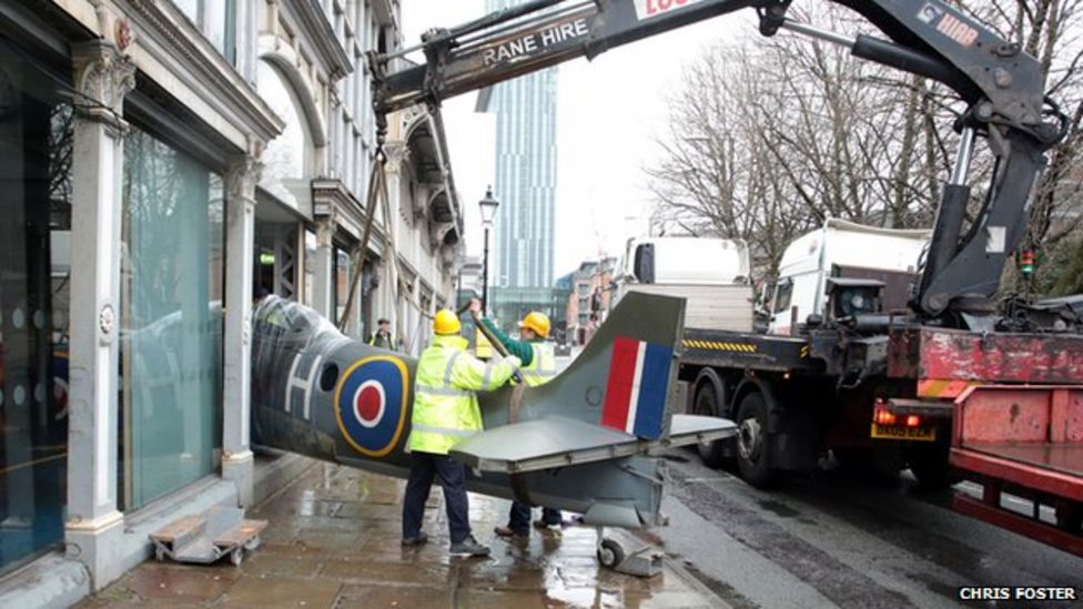 RAF Spitfire closes road in Manchester MOSI Museum move - BBC News
