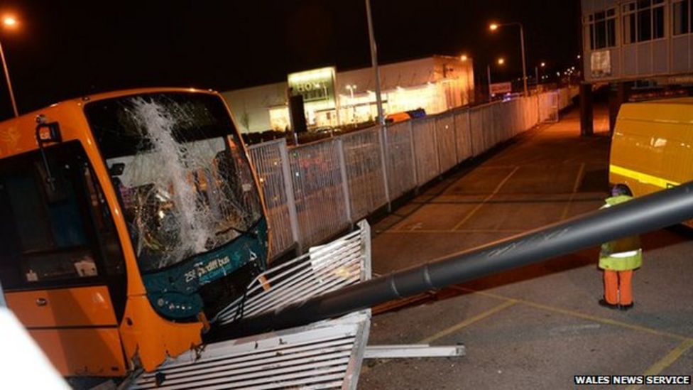 Bus crashes into railings of tax office in Llanishen, Cardiff - BBC News