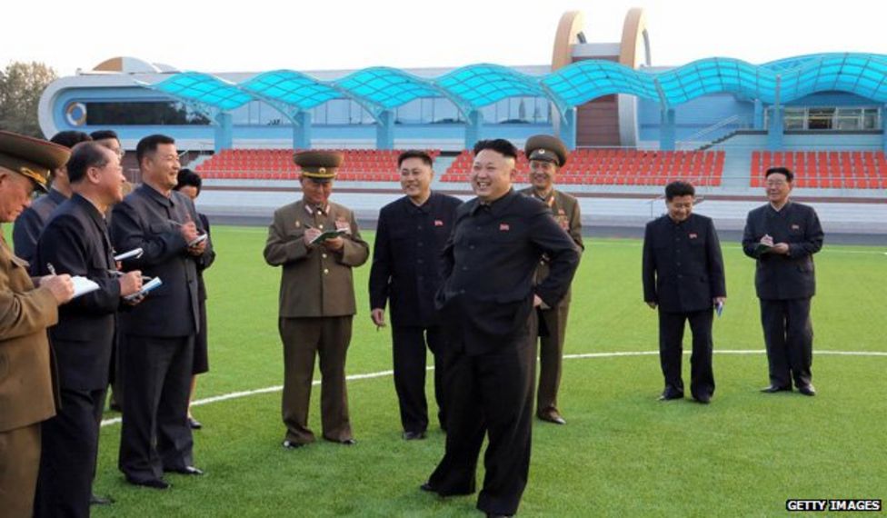Why is Kim Jong-un always surrounded by people taking notes? - BBC News