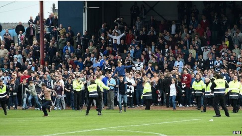 Corner flag pinched by pitch invader appears on eBay - BBC News