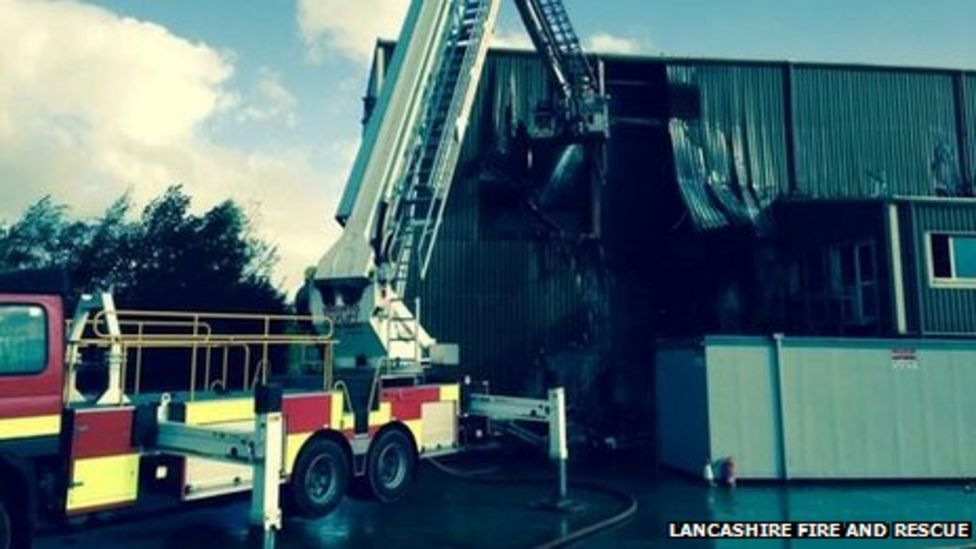 Burnley warehouse fire involving 600 tons of recycling waste - BBC News