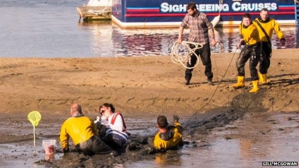 Rescue after family stuck in mud on Conwy beach - BBC News