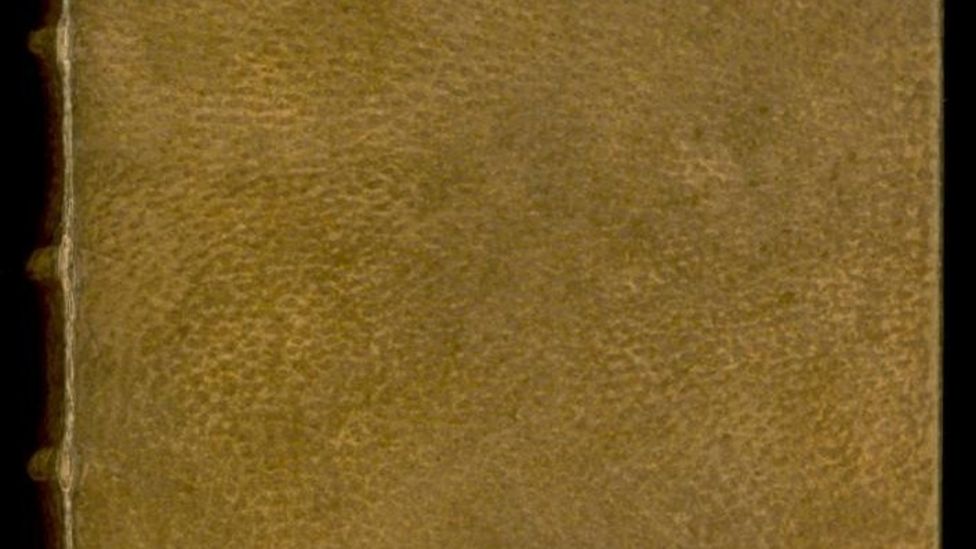 Harvard University removes human skin binding from book - BBC News