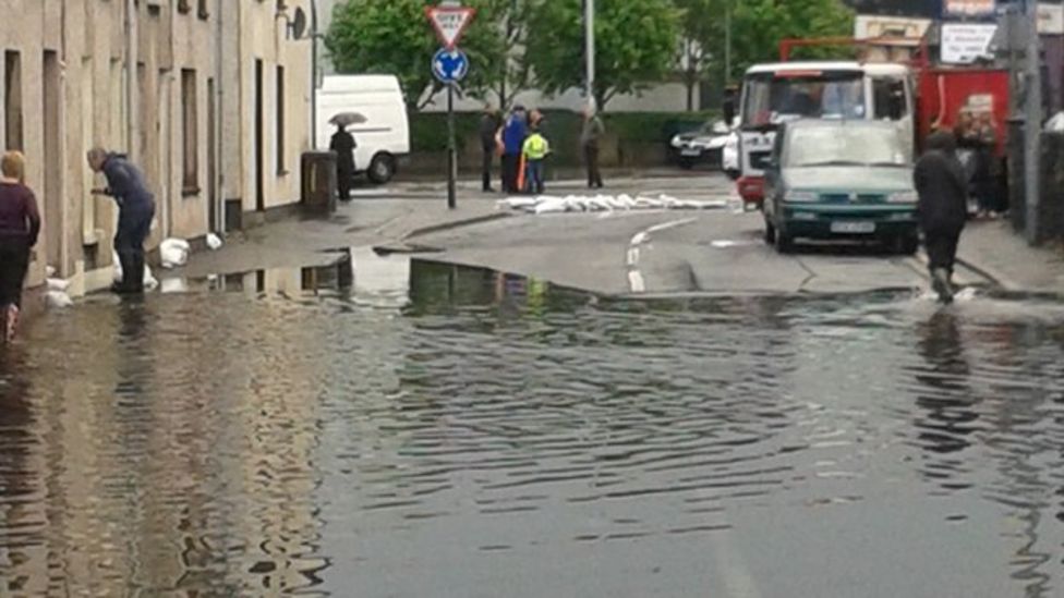 Heavy rain: County Antrim homes flooded and properties damaged - BBC News