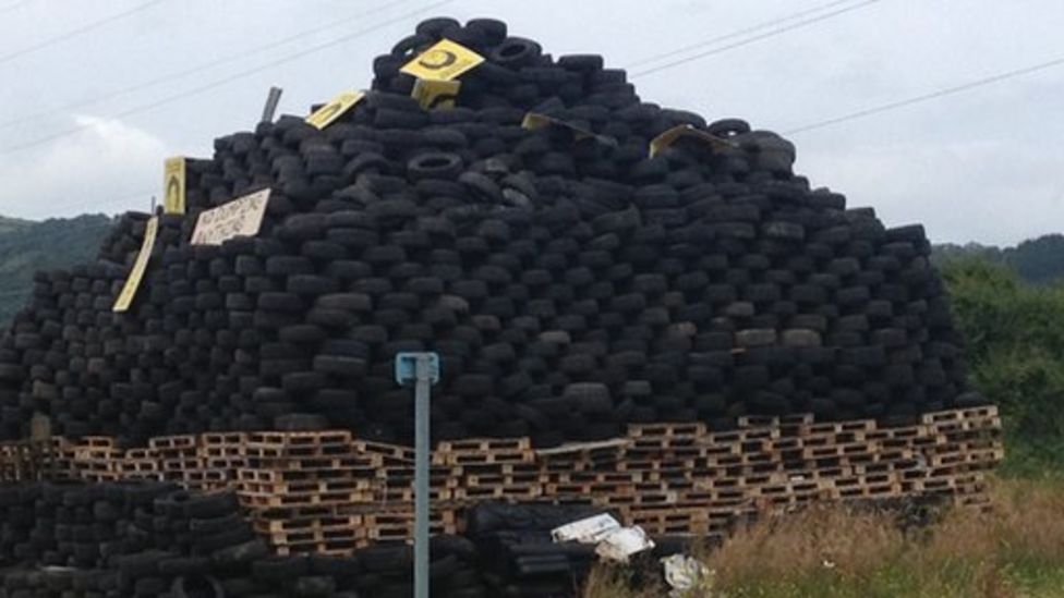 Election posters 'should be removed' from NI bonfires - BBC News