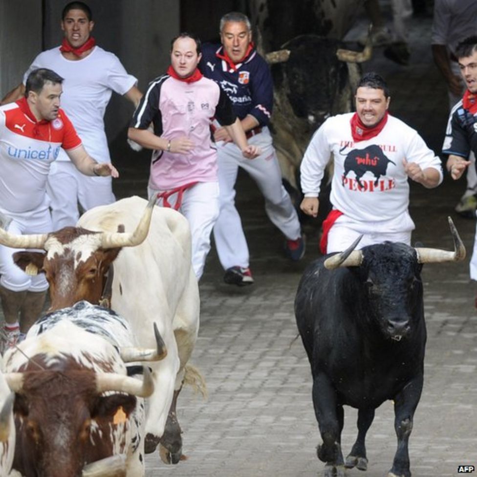 In pictures: Spain's Pamplona bull run - BBC News