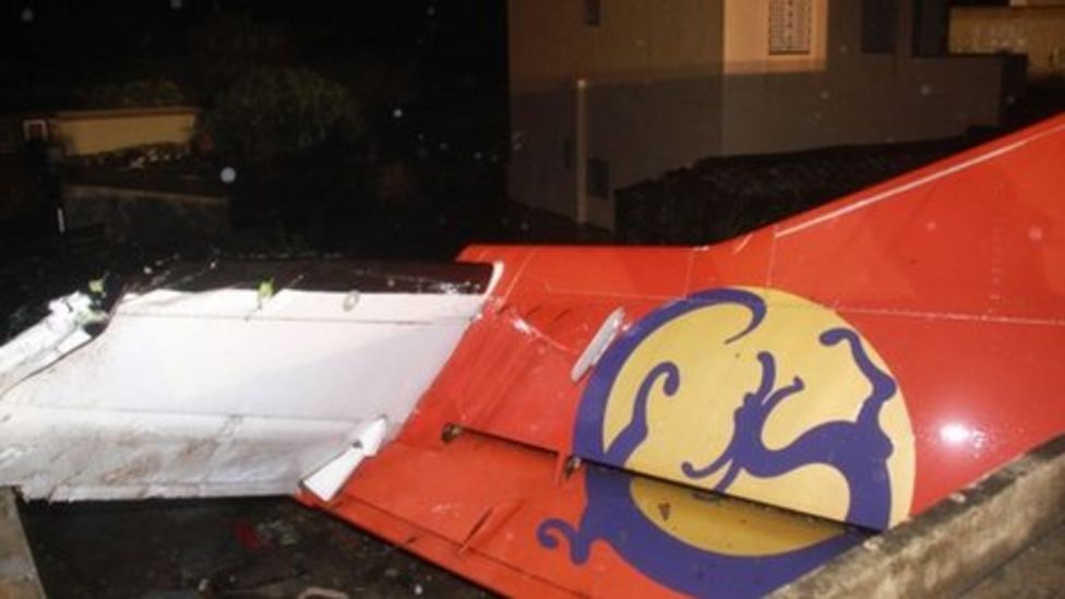 Taiwan plane crash: Toll hits 48 as families visit scene - BBC News