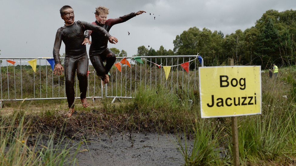 Muddy fun in the Irish Bog Snorkelling Championships - BBC Newsround