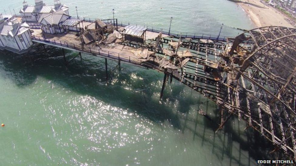 Eastbourne Pier fire: Uninsured kiosk holders to 'get help' - BBC News