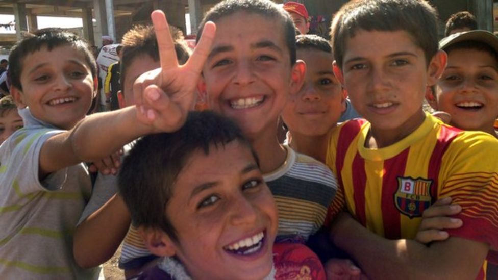 Playfulness masks pain and trauma of Iraq's children - BBC News