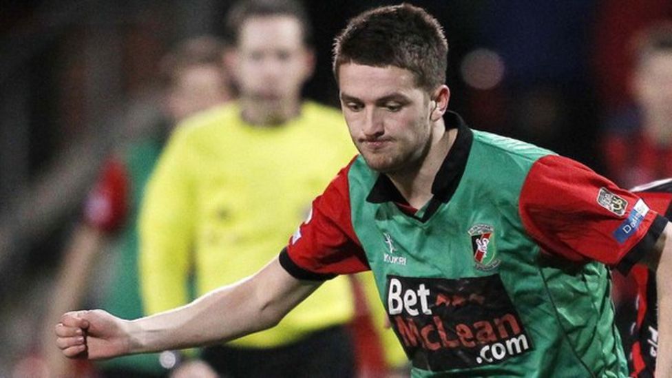 Cliftonville goalkeeper Conor Devlin guilty of assault - BBC News