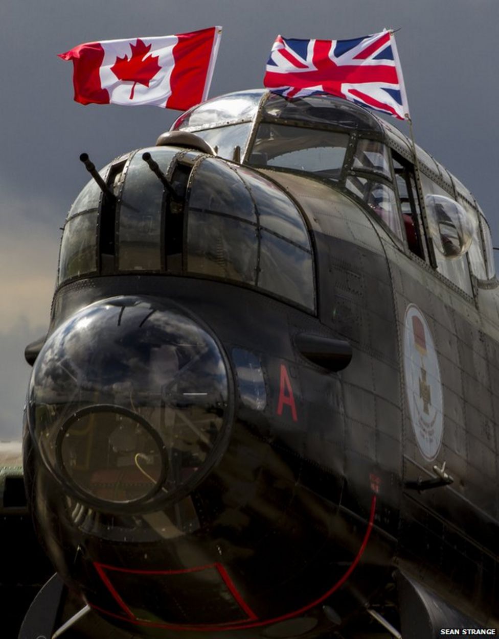 Two Lancasters fly together for the last time - BBC News