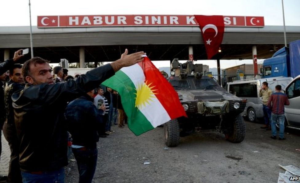 Islamic State conflict: Kurdish fighters arrive in Turkey - BBC News