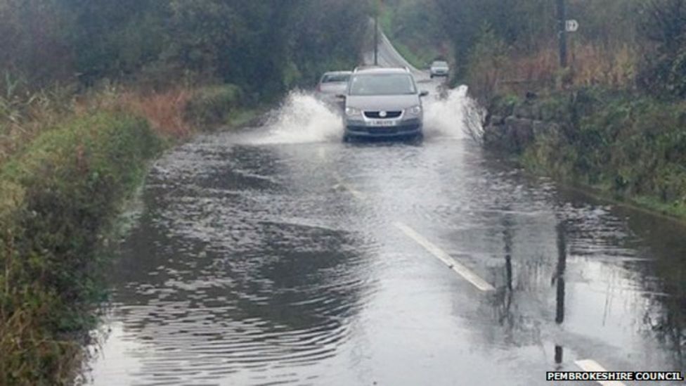 Flooding in Pembrokeshire and Ceredigion after downpours - BBC News