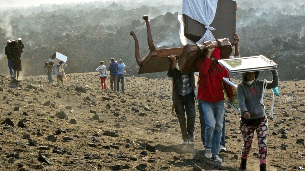 In pictures: Pico do Fogo volcano in Cape Verde erupts - BBC News