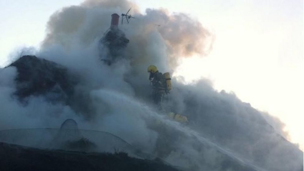 Fontmell Magna thatched roof fire fought for hours - BBC News