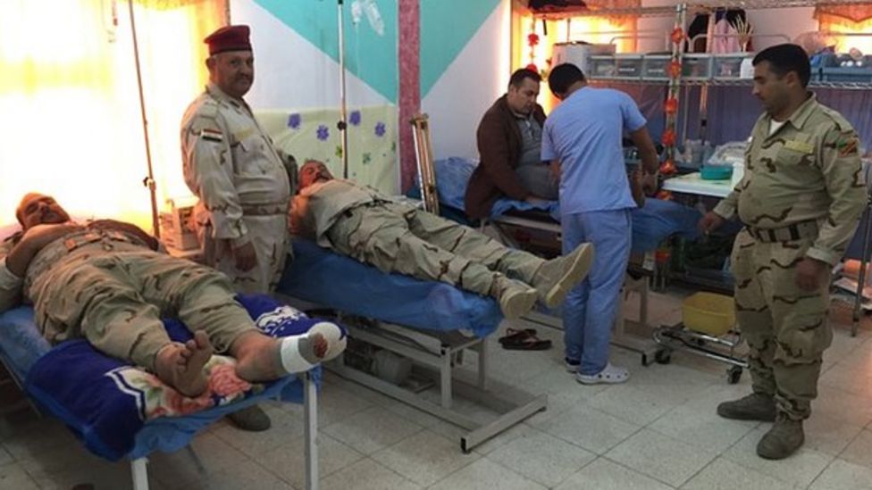 Inside Iraqi air base as Islamic State closes in - BBC News
