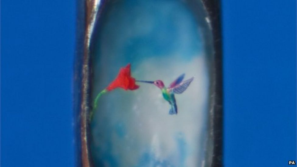 Willard Wigan's microscopic artworks exhibited in Birmingham - BBC News