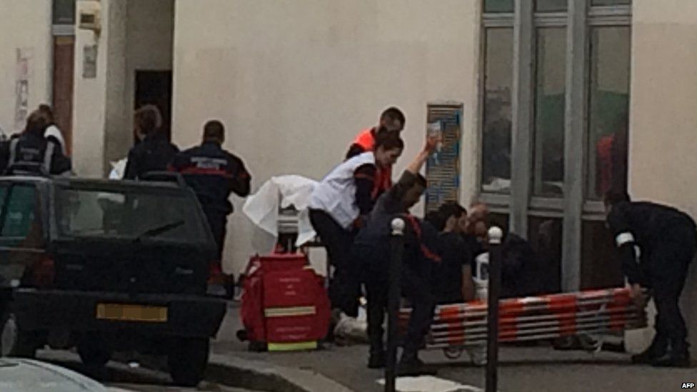 In pictures: Gun attack on French magazine - BBC News