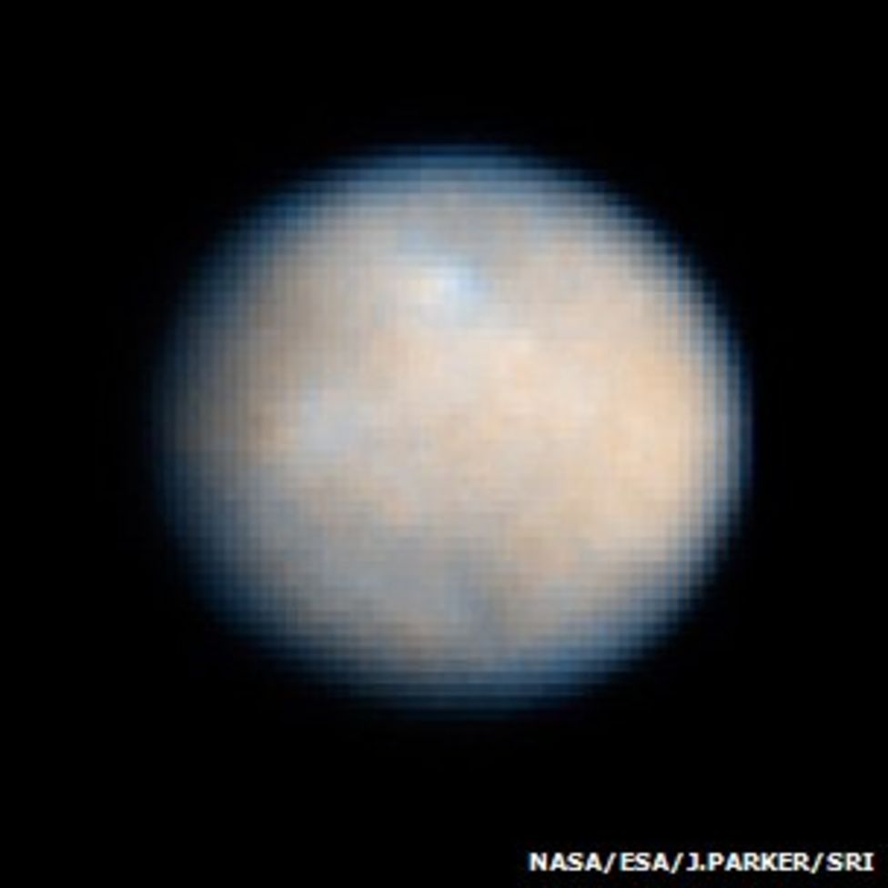 'Planet' Pluto comes into view - BBC News