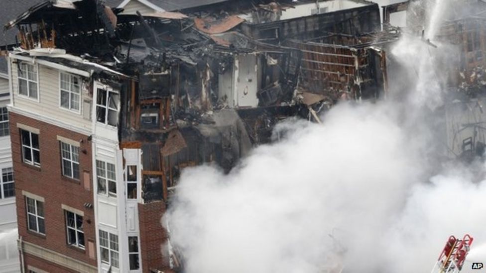 Huge fire razes New Jersey block of flats - BBC News