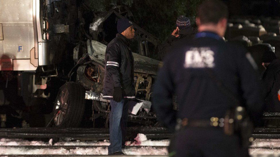 In pictures: New York train crash aftermath - BBC News