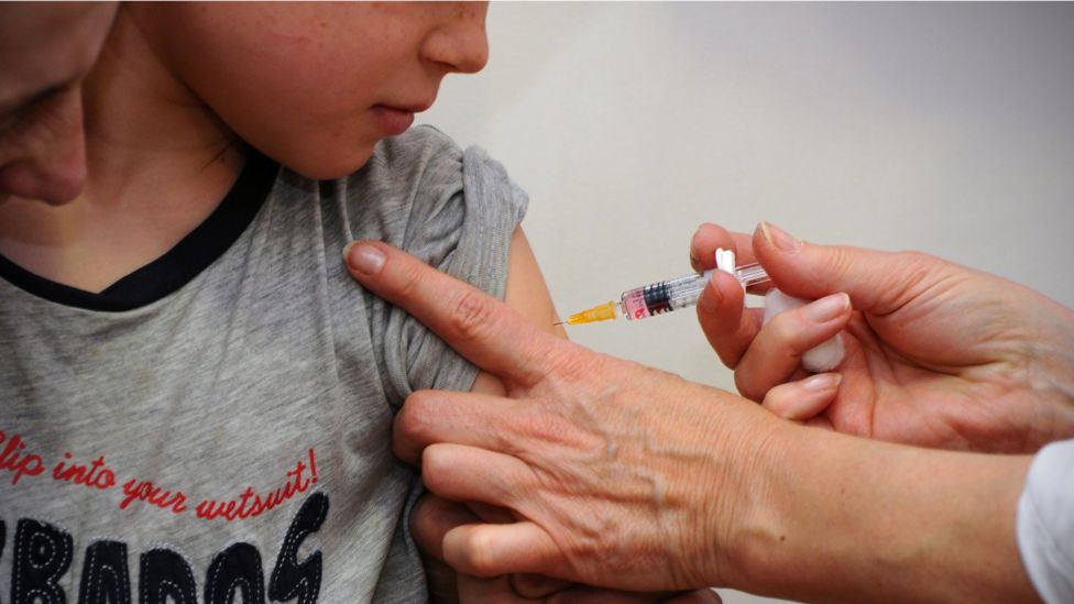 Germany court orders measles sceptic to pay 100,000 euros - BBC News