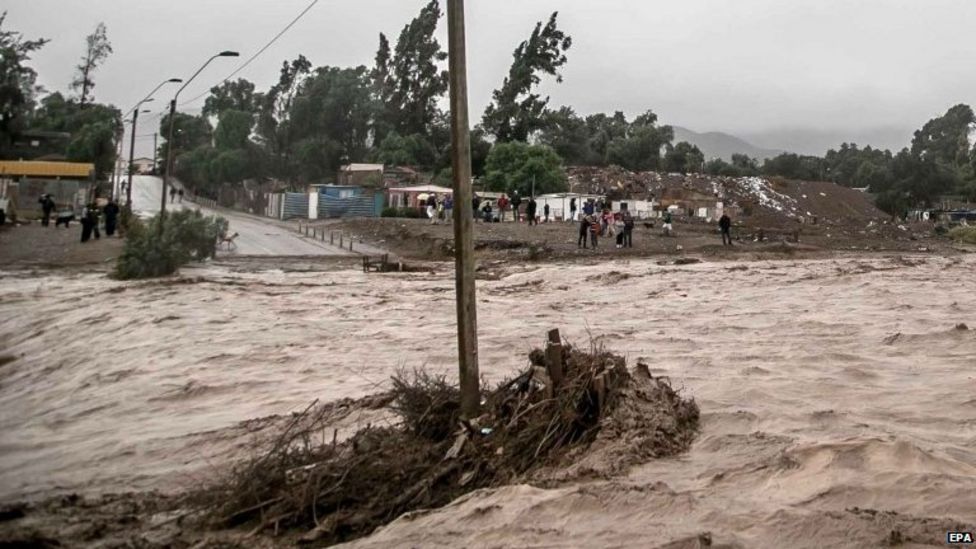 Chile floods death toll rises to 17 as clean-up begins - BBC News