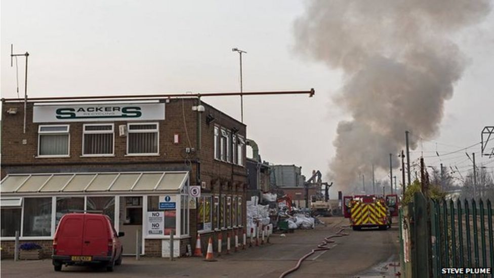 Great Blakenham scrap yard fire closes railway line - BBC News