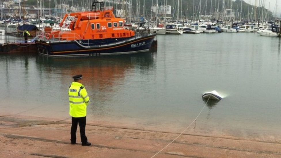 Brixham boat capsizes leaving one dead and three injured - BBC News