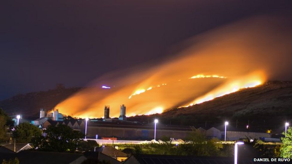 Carn Brea gorse fire tackled by firefighters - BBC News