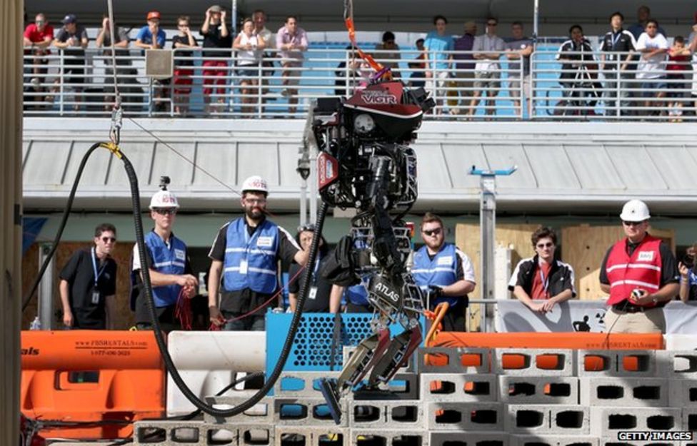 Disaster droids face off in the Darpa Robotics Challenge - BBC News