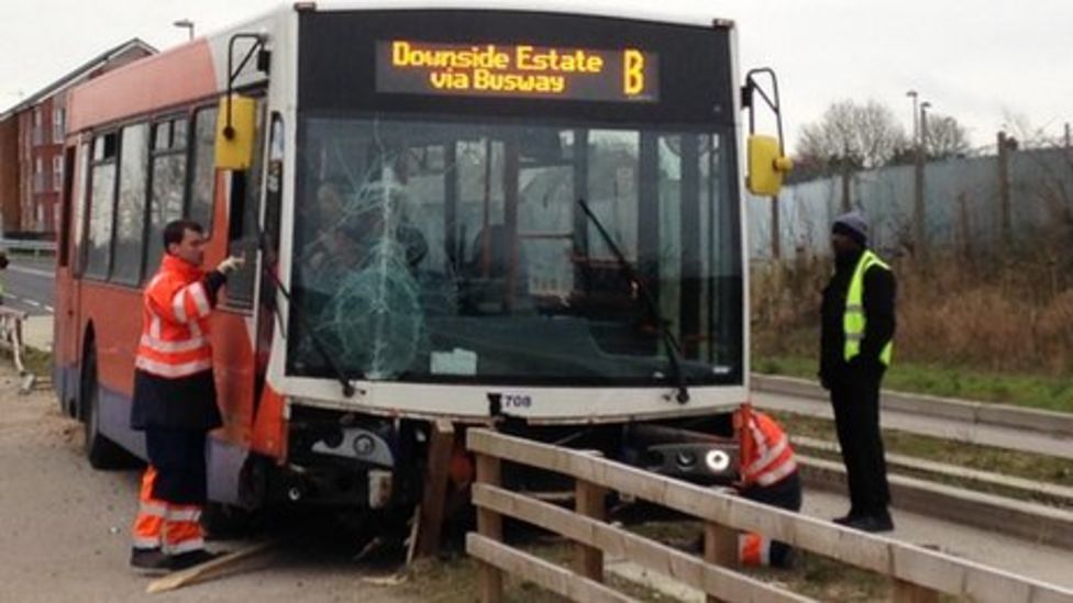 Luton-Dunstable busway vehicle crashes through fence - BBC News