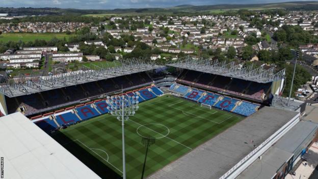 Burnley condemn fans' behaviour during Premier League defeat by Man ...