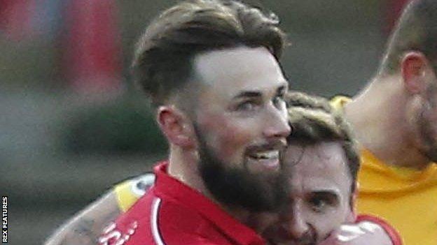 Chris Holroyd agrees new deal as seven depart Wrexham - BBC Sport