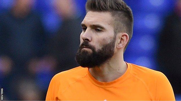 Bartosz Bialkowski: Ipswich keeper's Millwall move off after ...