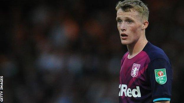 Jake Doyle-Hayes of Aston Villa and Middlesbrough's Hayden Coulson join ...
