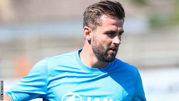 Aarran Racine: Torquay defender injures knee when conceding penalty on ...